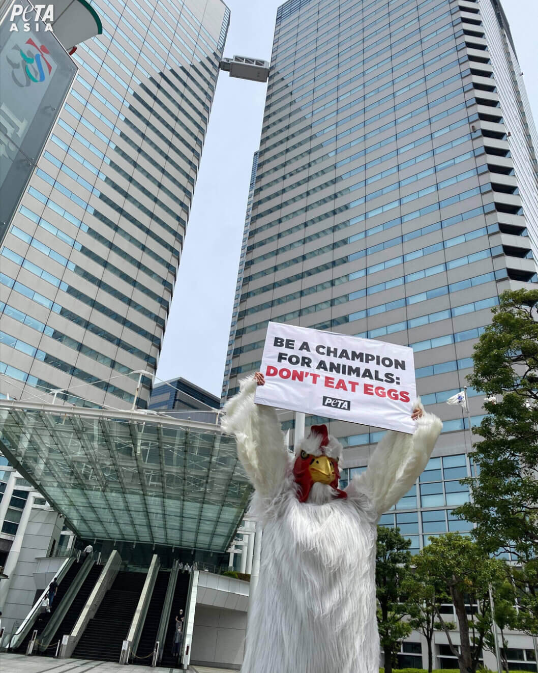 Why Did This ‘Chicken’ Protest Outside the Olympics HQ in Tokyo, Japan?