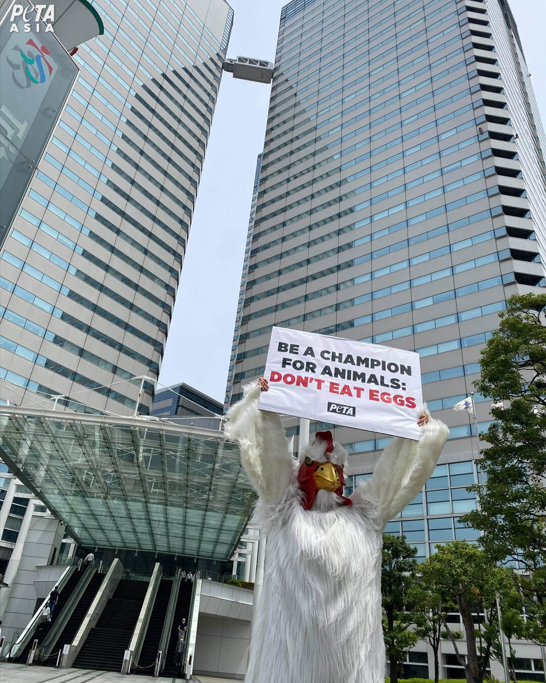 Why Did This ‘Chicken’ Protest Outside the Olympics HQ in Tokyo, Japan?