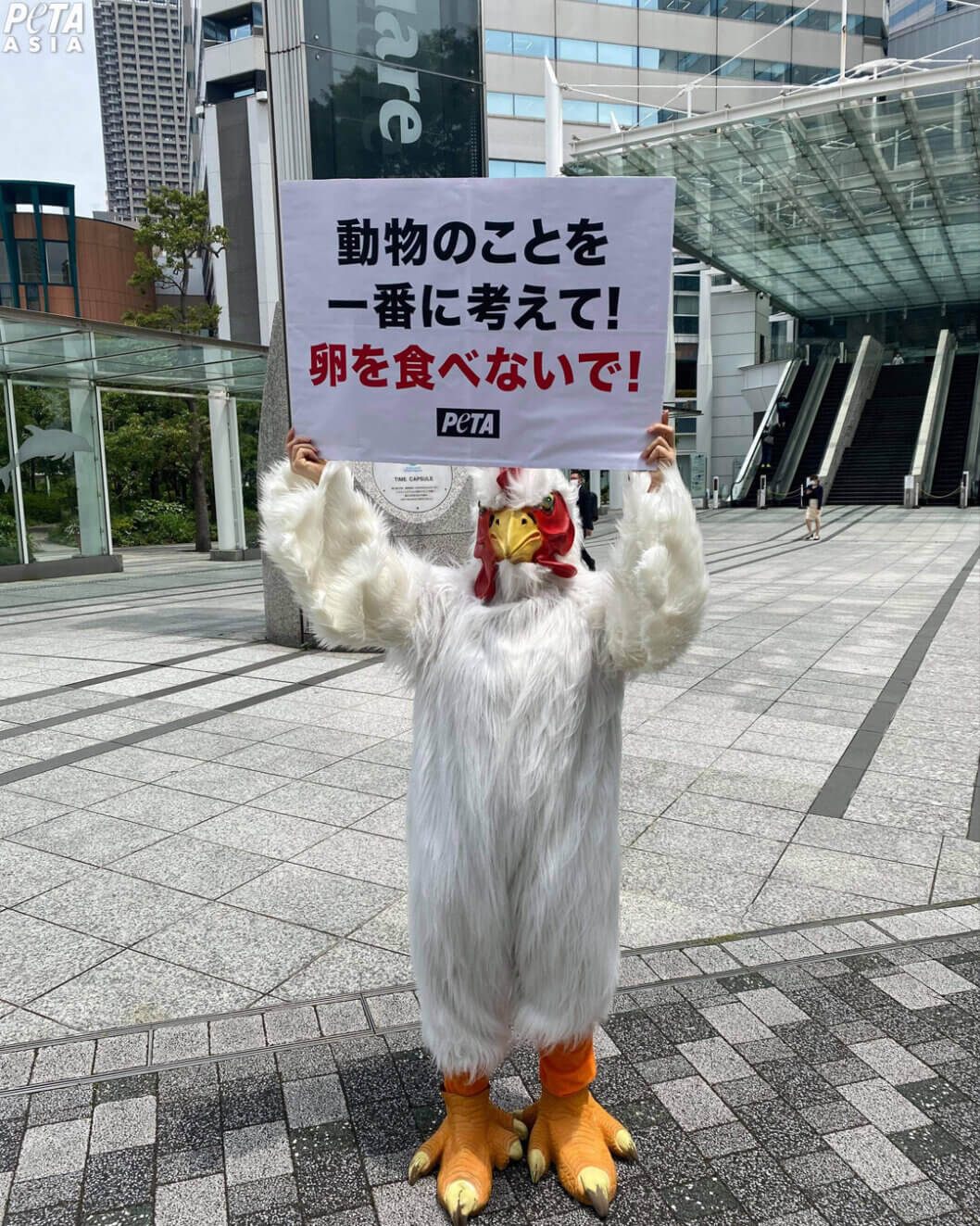 Why Did This ‘Chicken’ Protest Outside the Olympics HQ in Tokyo, Japan?