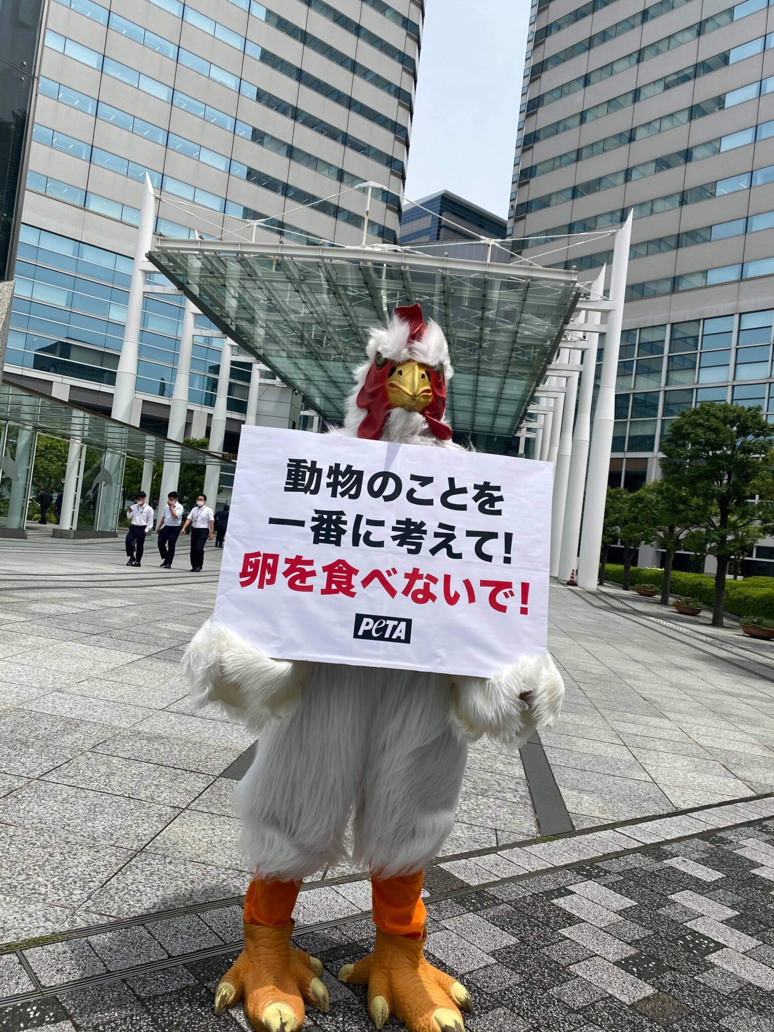 Why Did This ‘Chicken’ Protest Outside the Olympics HQ in Tokyo, Japan?